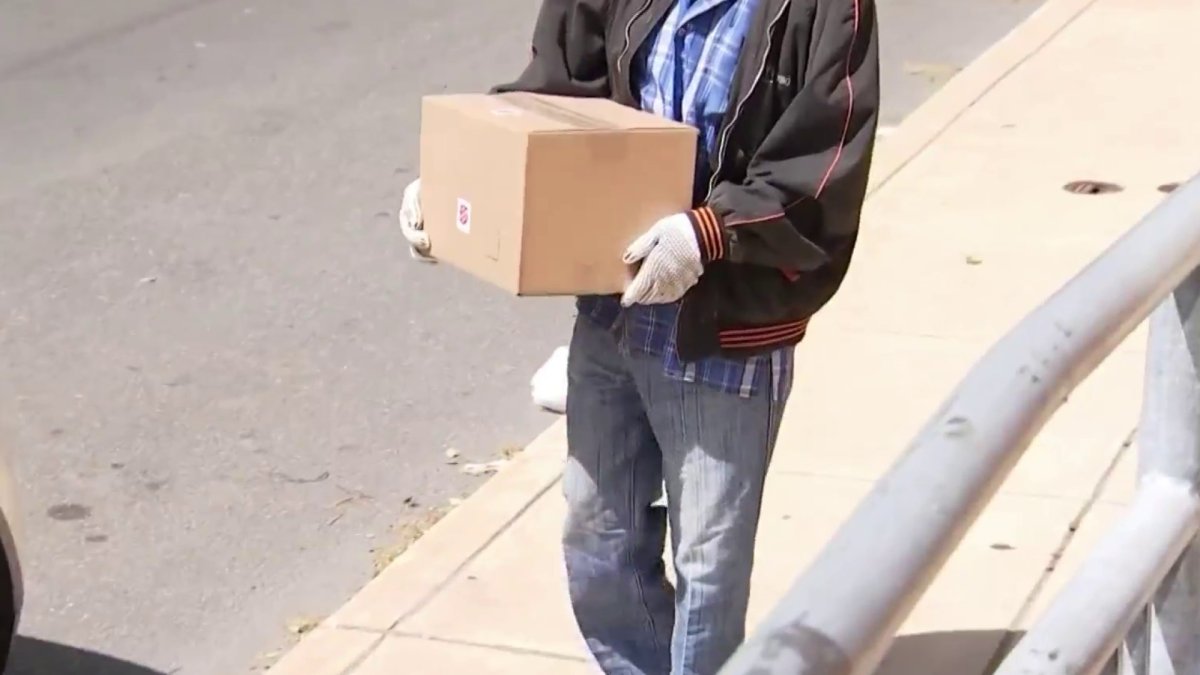 Giving Tuesday: Salvation Army Hands Out Food Boxes to Families in Need ...