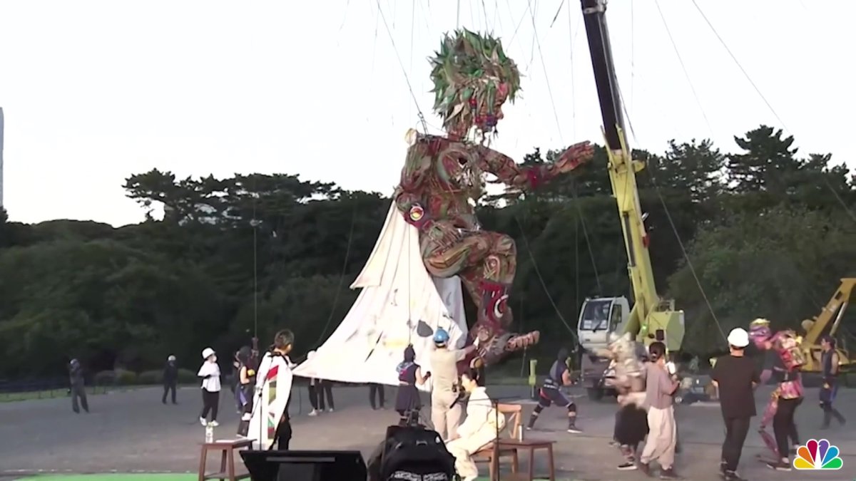 WATCH: Giant Puppet Dancing Around Tokyo to Promote Olympics – NBC10 ...