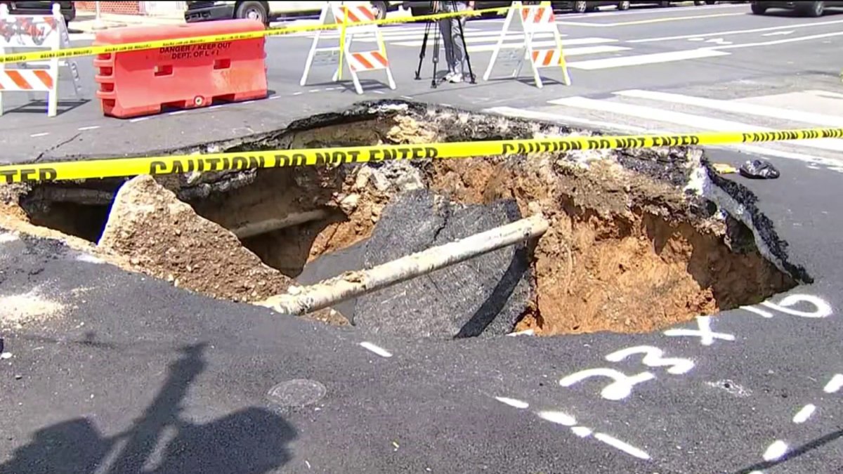 Water department and PGW investigating massive sinkhole in West ...