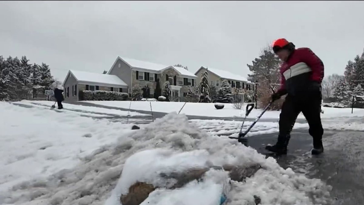 Snow clean-up crews working to beat the refreeze expected Tuesday night ...