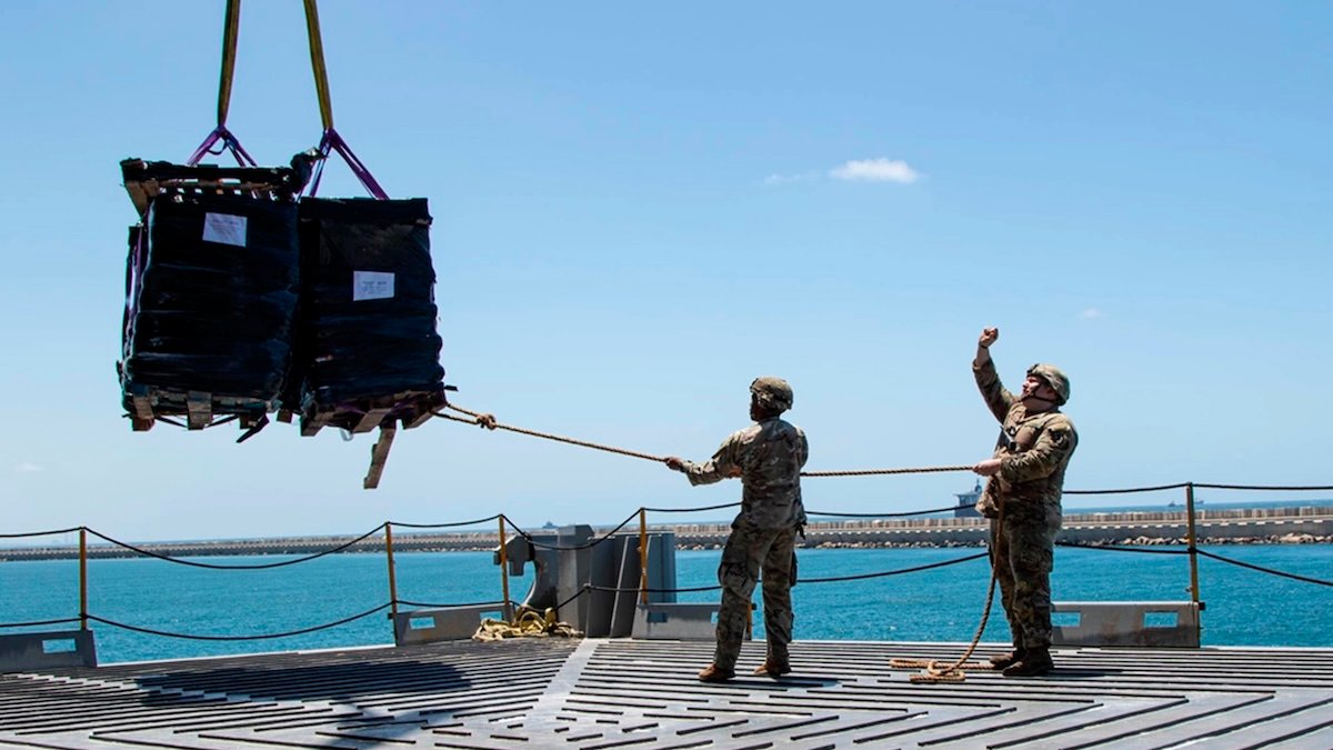 First aid shipment driven across newly built US pier into the Gaza ...
