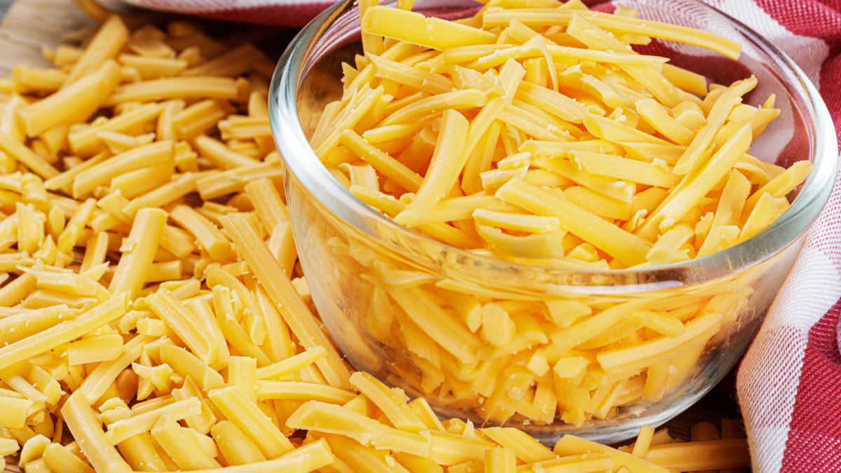 What is that powder on shredded cheese, and is it bad for you? A ...