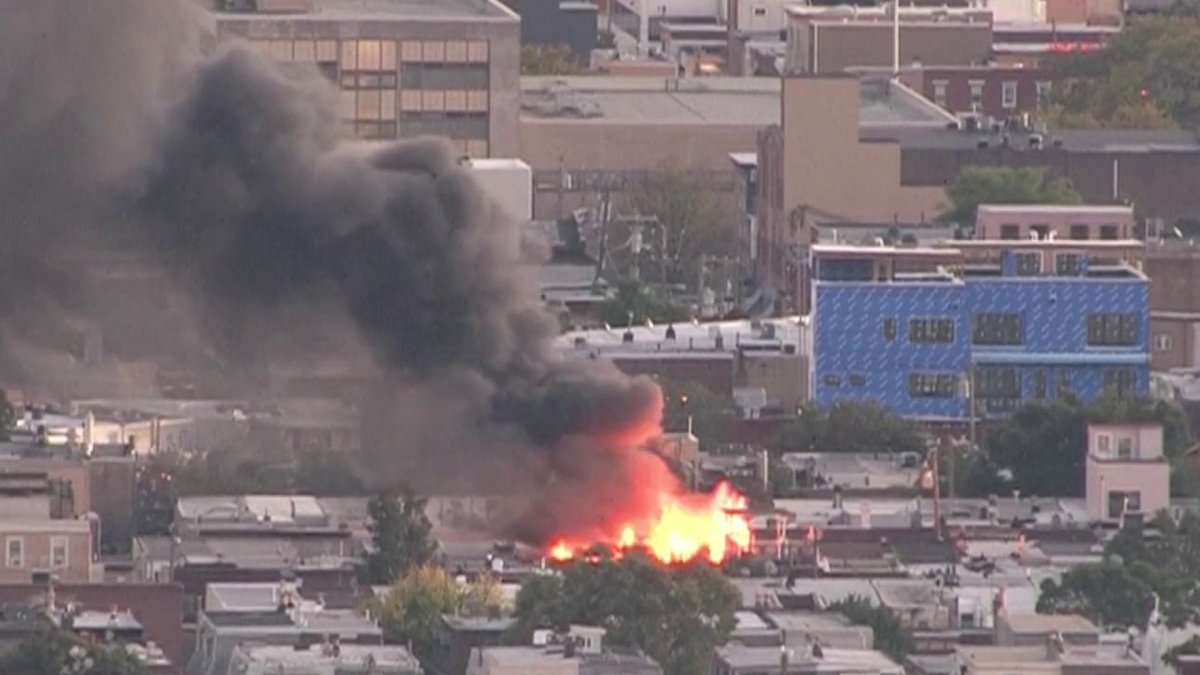 Massive house fire in South Philly sent smoke and flames billowing into ...