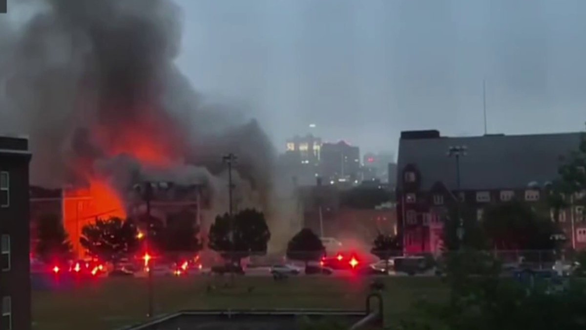 Firefighters continue to battle massive fire at vacant building in West ...