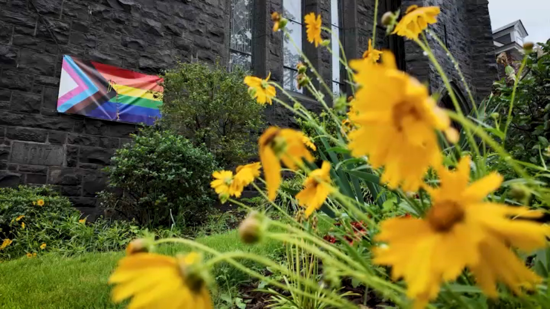 Ripped Pride flag at Del. church flies again after being repaired ...