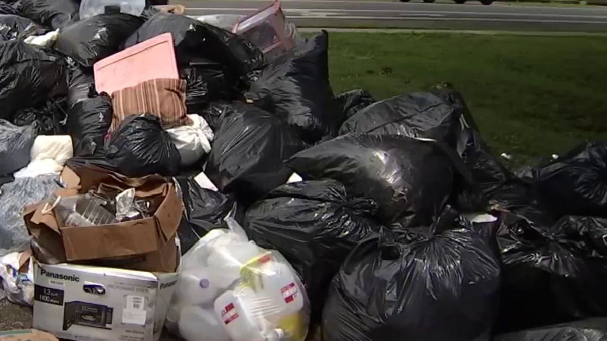 Trash piles grow in Philadelphia as workers strike continues into day 2 ...