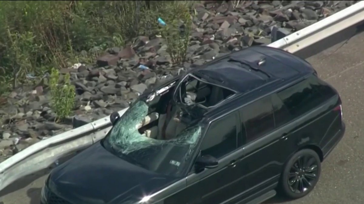 2 hurt after tire smashes through windshield of SUV on Northeast ...