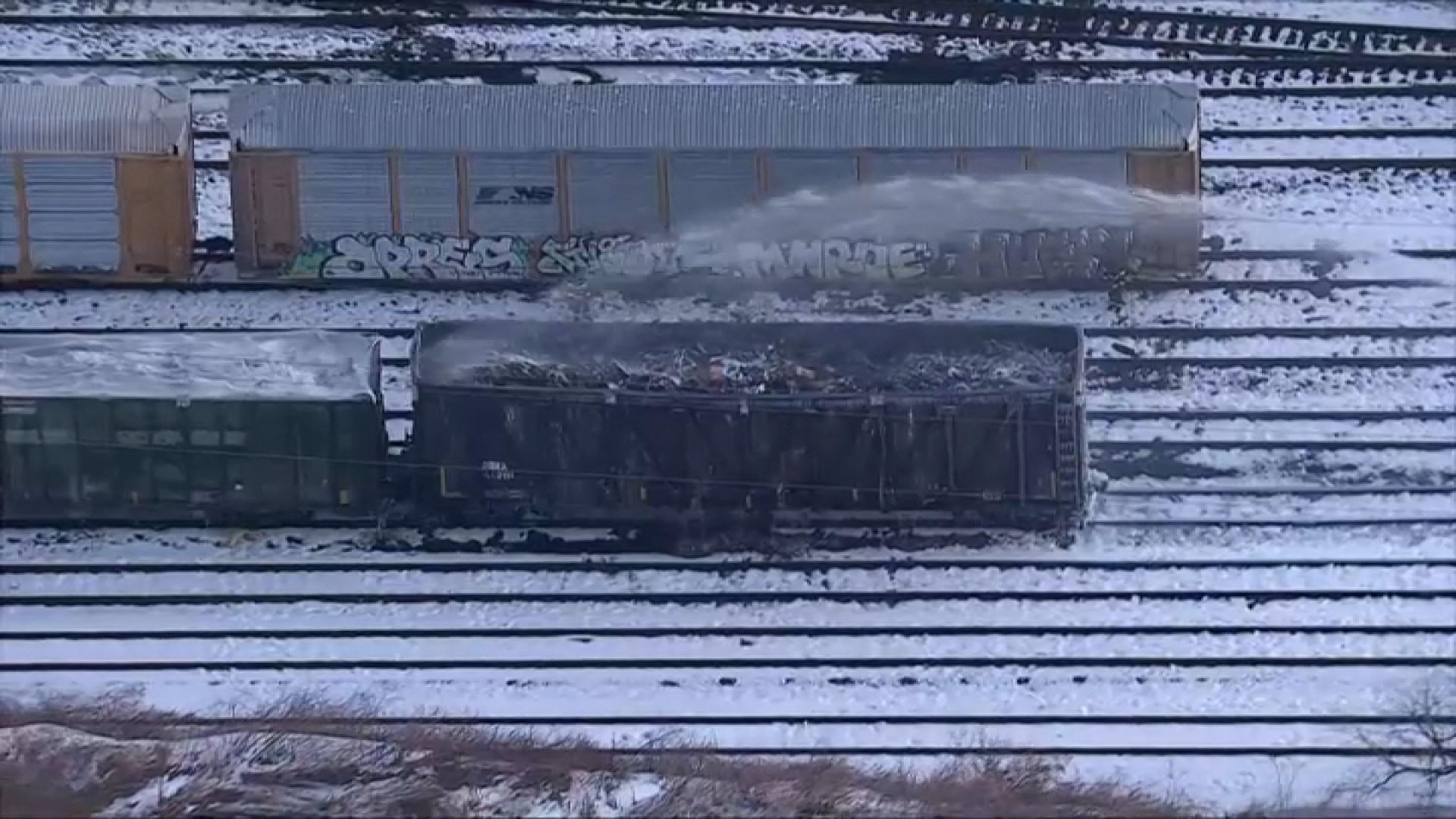 Firefighters put out hot spots from train fire near Falls Bridge ...