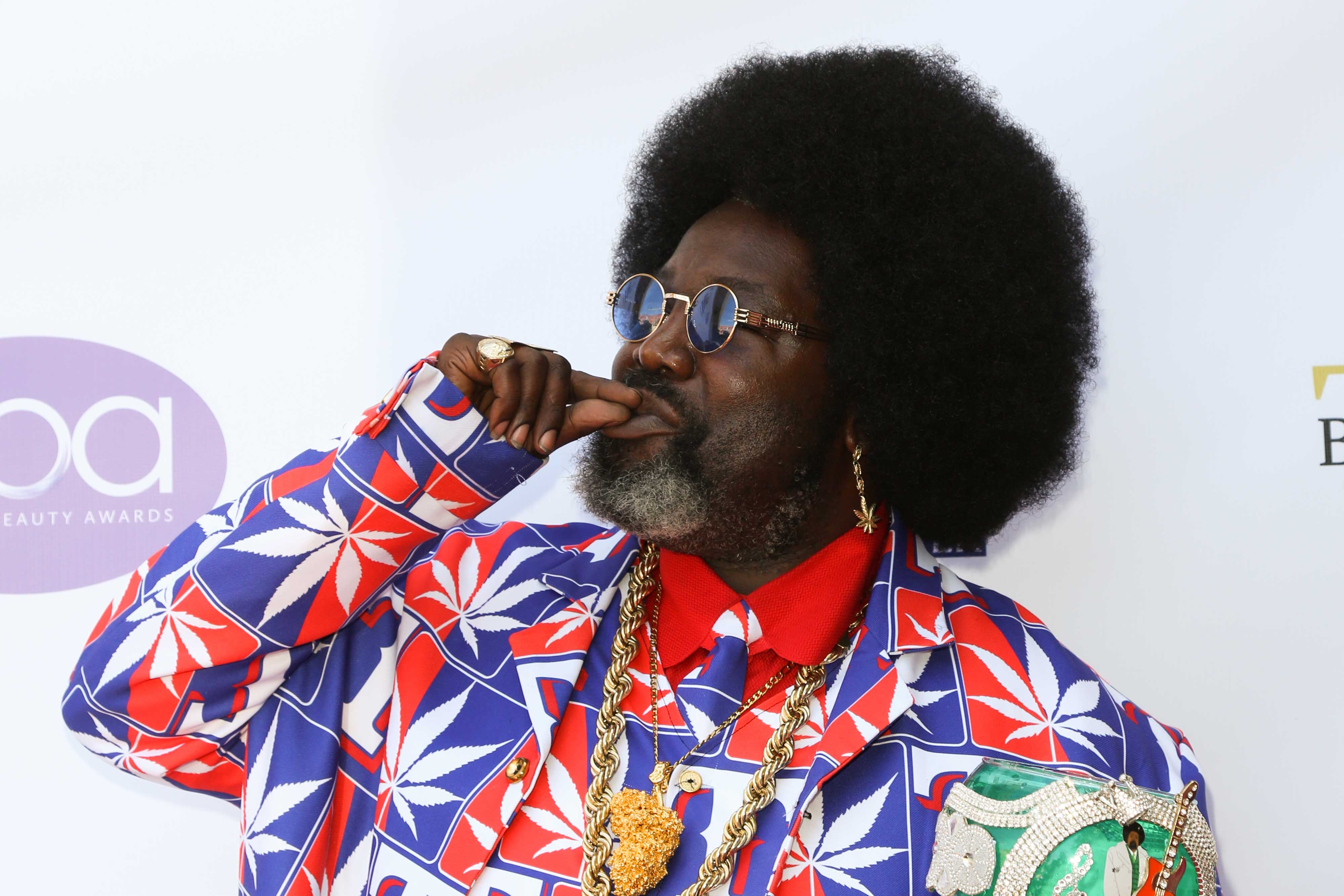 Rapper Afroman wins lawsuit over use of police home raid footage ...